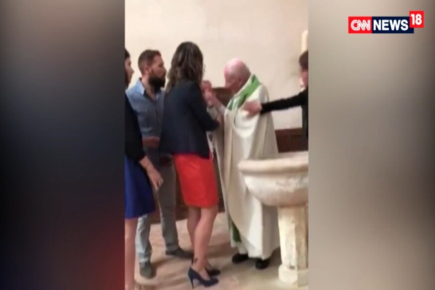 Watch: Priest Loses Temper And Slaps Toddler During Baptism - News18