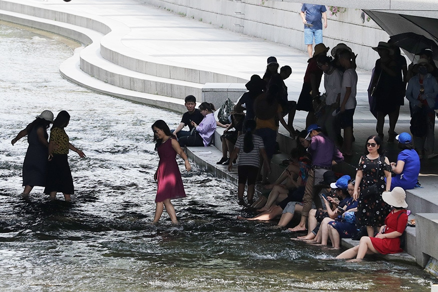 People Beat The Heat in Style as Heat Wave Break Records in Japan & S ...