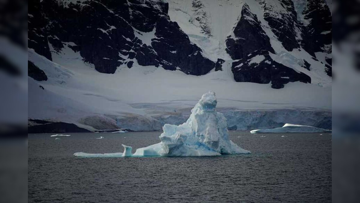 Huge Iceberg Drifts Close to Greenland Village, Causing Fears of a ...