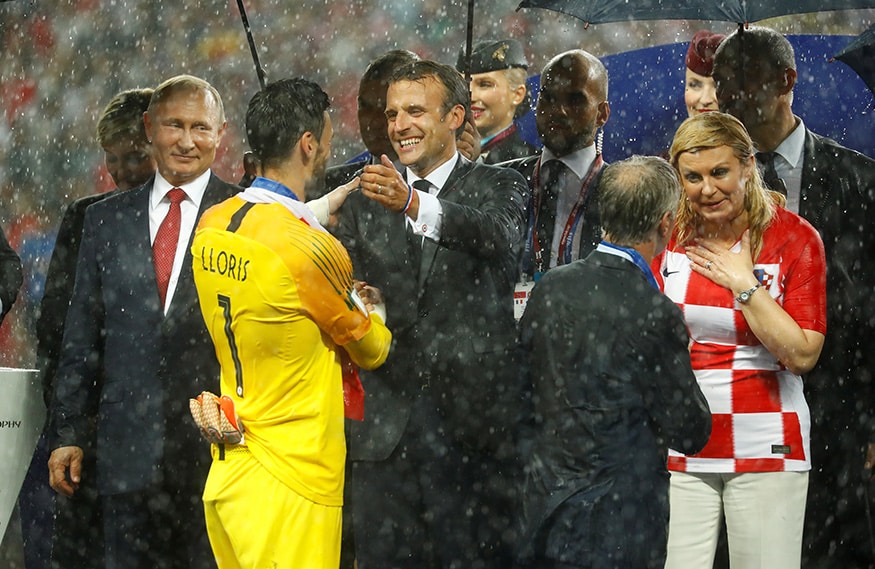 Vladimir Putin’s Umbrella Act Steals the Show at FIFA World Cup ...