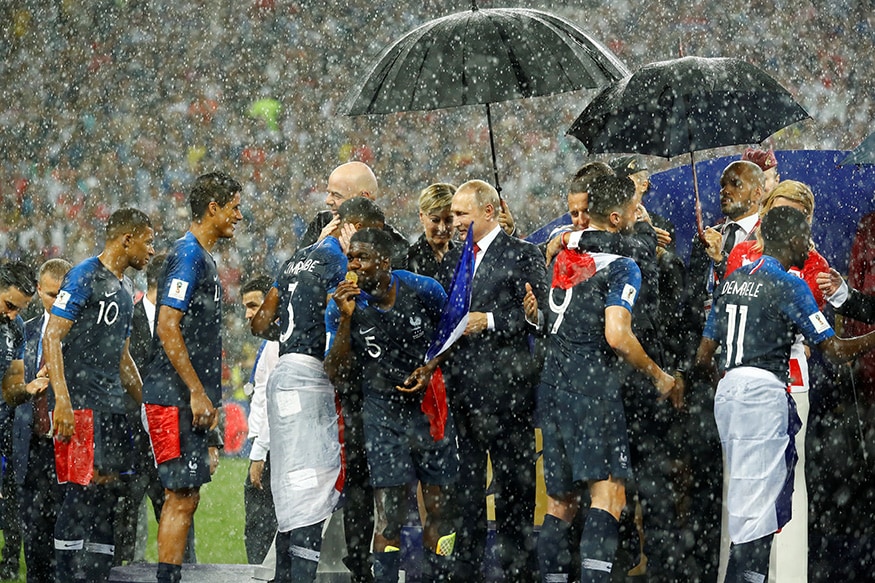 Vladimir Putin’s Umbrella Act Steals the Show at FIFA World Cup ...
