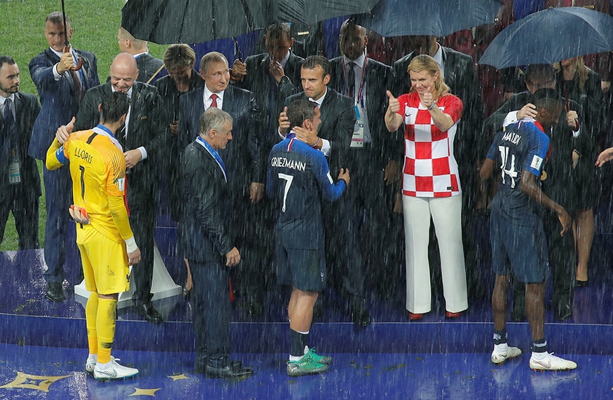 Vladimir Putin’s Umbrella Act Steals the Show at FIFA World Cup ...