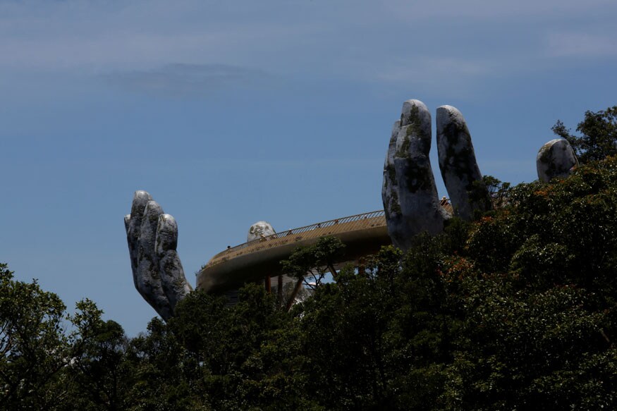 PHOTOS: Giant Hands Hold Vietnam's Golden Bridge - News18