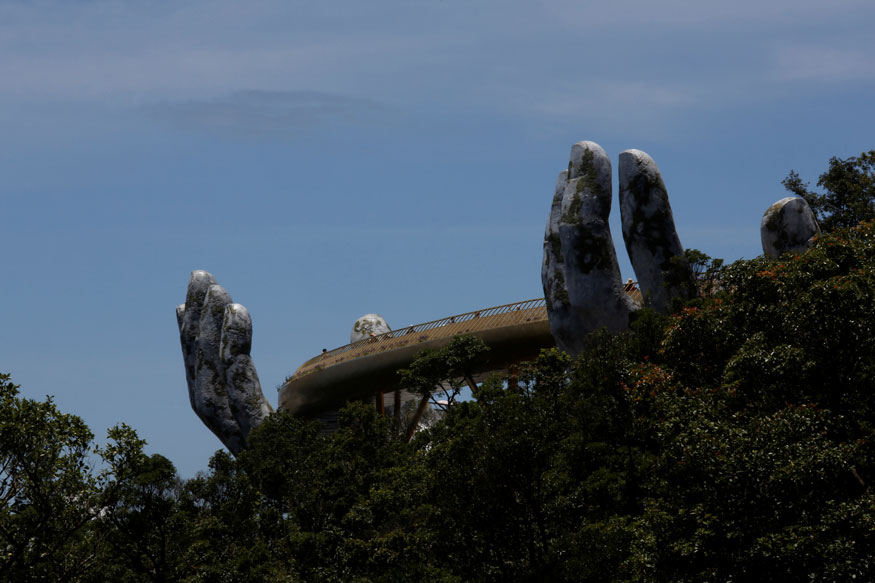 PHOTOS: Giant Hands Hold Vietnam's Golden Bridge - News18