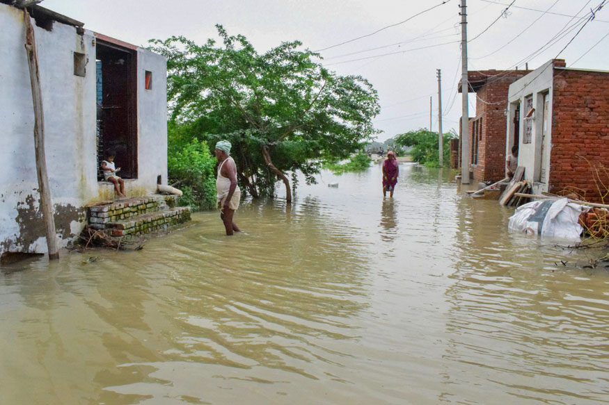 India's 2018 Monsoon: Dramatic Pics Show Aftermath of Heavy Rain - News18