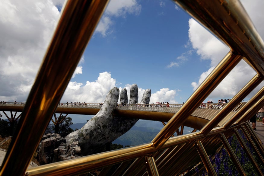 PHOTOS: Giant Hands Hold Vietnam's Golden Bridge - News18