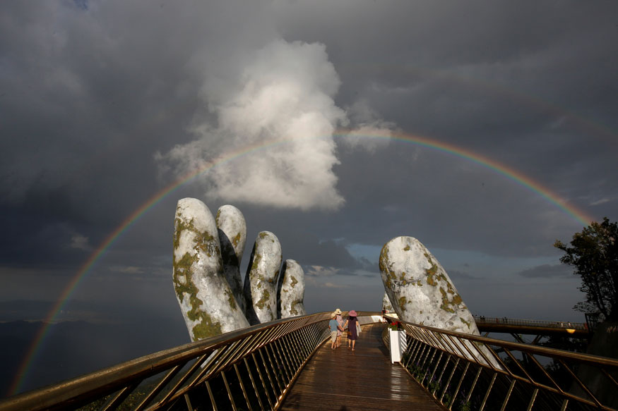PHOTOS: Giant Hands Hold Vietnam's Golden Bridge - News18