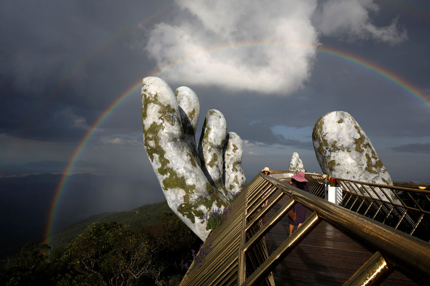 PHOTOS: Giant Hands Hold Vietnam's Golden Bridge - News18