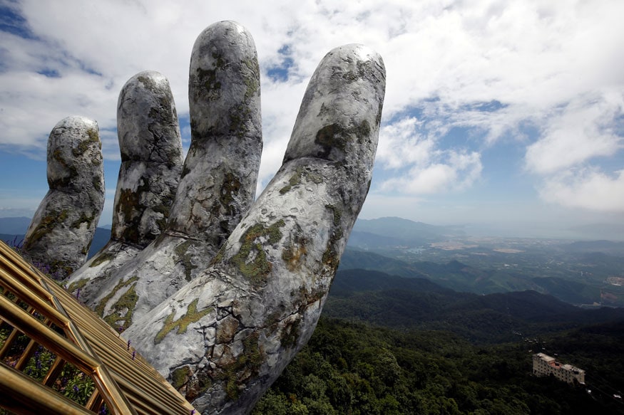 PHOTOS: Giant Hands Hold Vietnam's Golden Bridge - News18