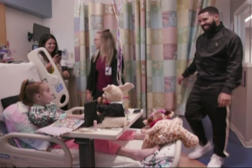 Singer Drake Mees 11-Year-Old Fan At Hospital