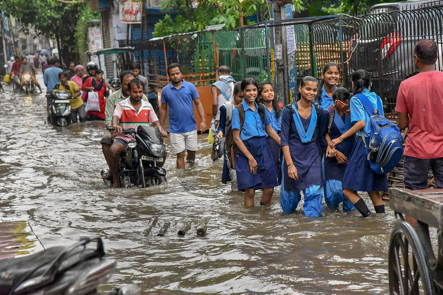 India's 2018 Monsoon: Dramatic Pics Show Aftermath of Heavy Rain - News18