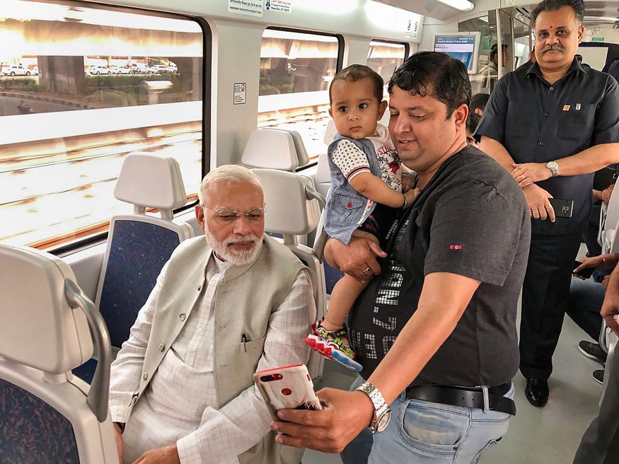 PM Narendra Modi Takes Metro Ride in Delhi; See Pictures - News18