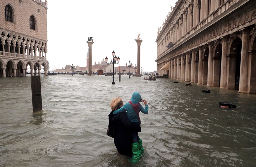 Rains Submerge Italy's Venice City, Bringing Life To A Standstill