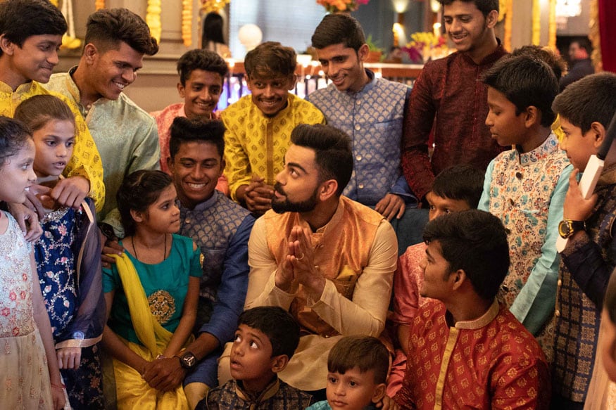 PICS: Virat Kohli & Co Celebrate Diwali With Dharavi Kids - News18