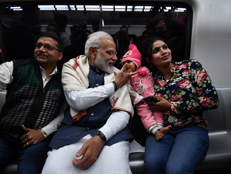 PM Narendra Modi Takes Delhi Metro Ride to ISKCON Temple - News18