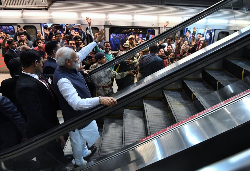 PM Narendra Modi Takes Delhi Metro Ride to ISKCON Temple - News18