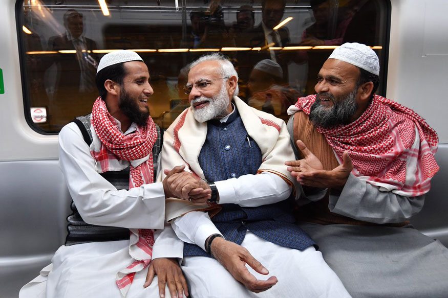 PM Narendra Modi Takes Delhi Metro Ride to ISKCON Temple - News18