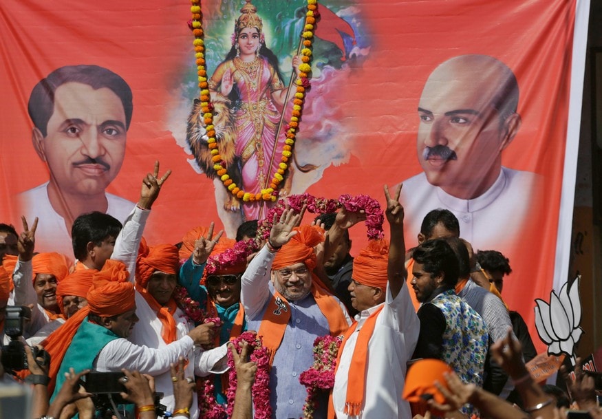 PICS| BJP President Amit Shah's Roadshow in Ahmedabad - News18