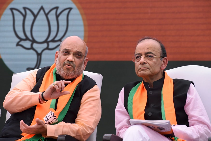 PM Modi, Amit Shah Unveil BJP's 'Sankalp Patra' Manifesto - News18