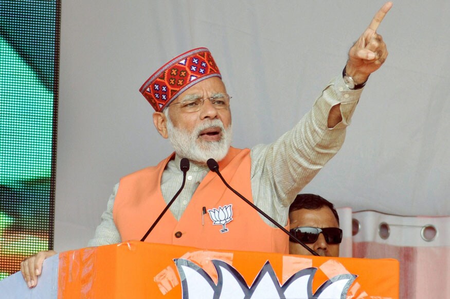 PHOTOS: Colourful Headgears of PM Narendra Modi - News18