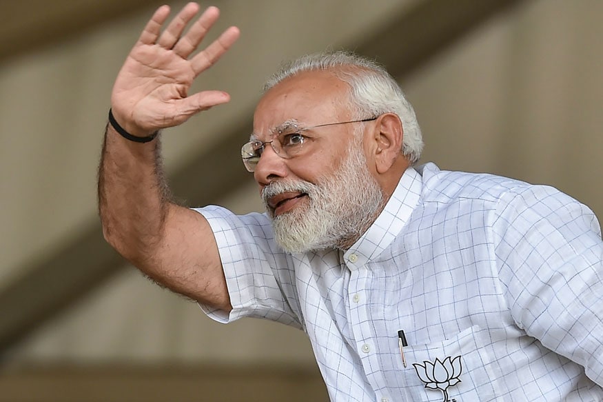 PHOTOS| PM Narendra Modi Addresses Mega Rally in Kolkata - News18