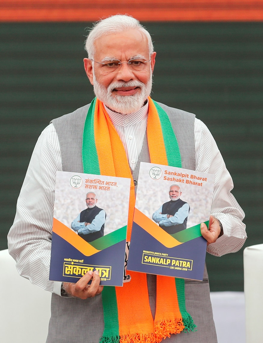 PM Modi, Amit Shah Unveil BJP's 'Sankalp Patra' Manifesto - News18