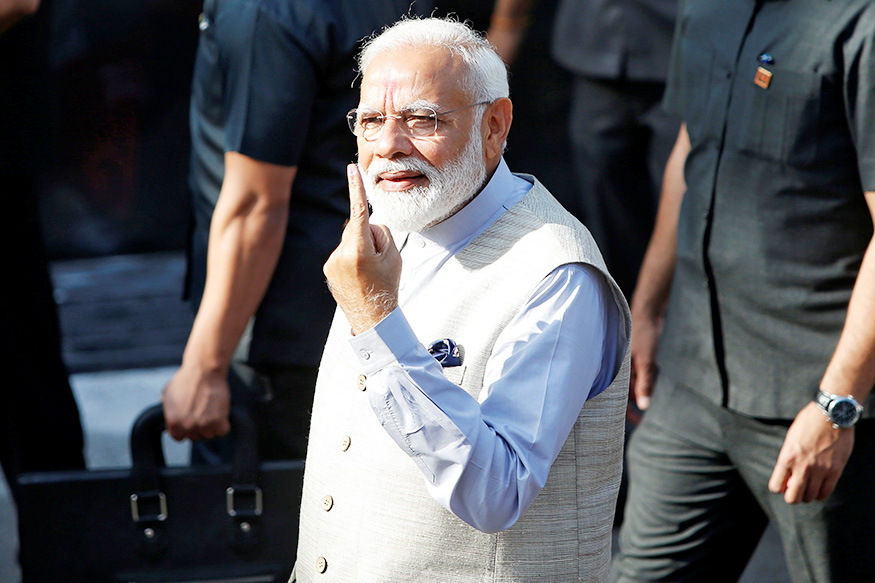 Photos Pm Narendra Modi Casts His Vote In Ahmedabad News18