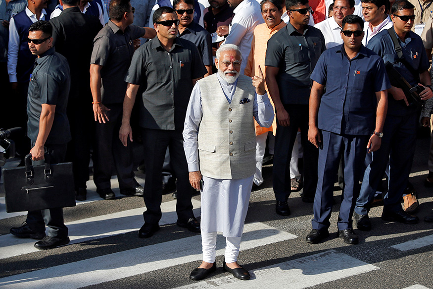 Photos Pm Narendra Modi Casts His Vote In Ahmedabad News18
