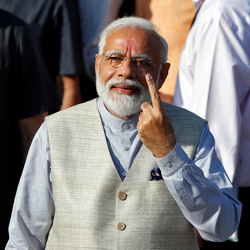 PHOTOS| PM Narendra Modi Casts His Vote in Ahmedabad - Photogallery