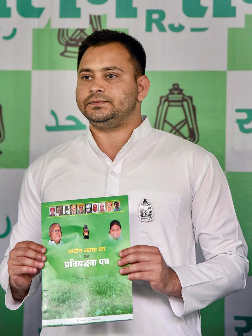 Tejashwi Yadav Releases RJD's Election Manifesto in Patna - News18