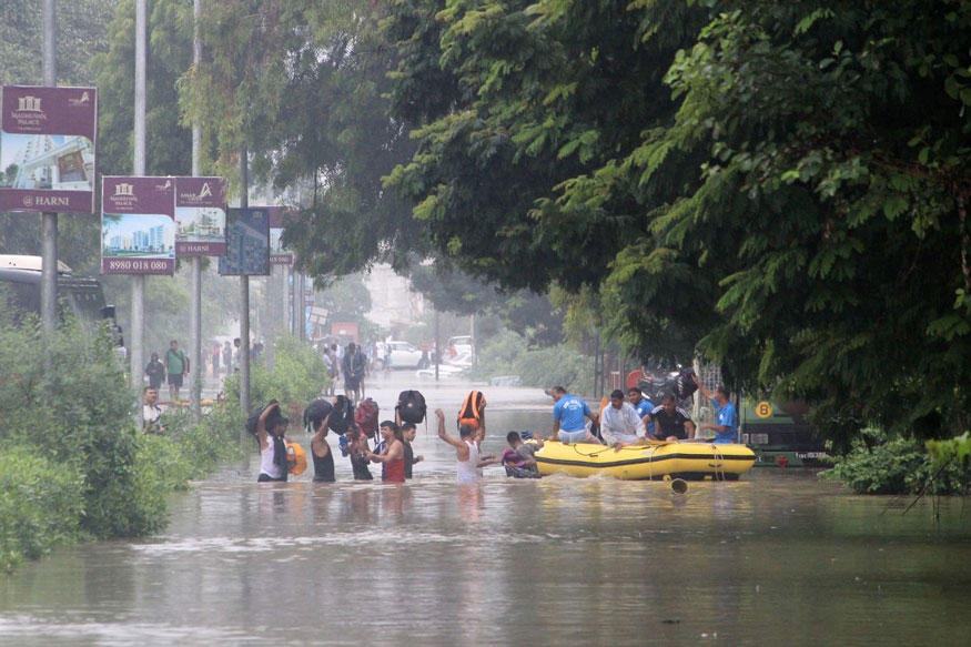 PHOTOS: Heavy Rains Lead to Flash Floods in Vadodara, Gujarat - News18