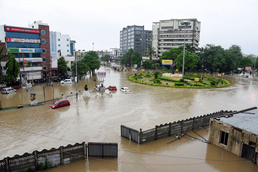 Photos Heavy Rains Lead To Flash Floods In Vadodara Gujarat News18