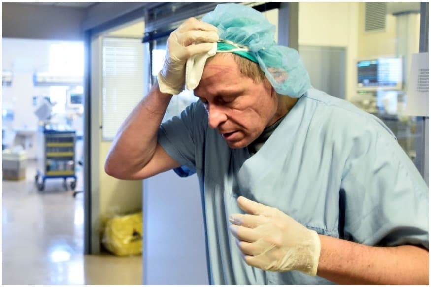 Heart-Wrenching Photos of Overworked Doctors & Nurses - News18