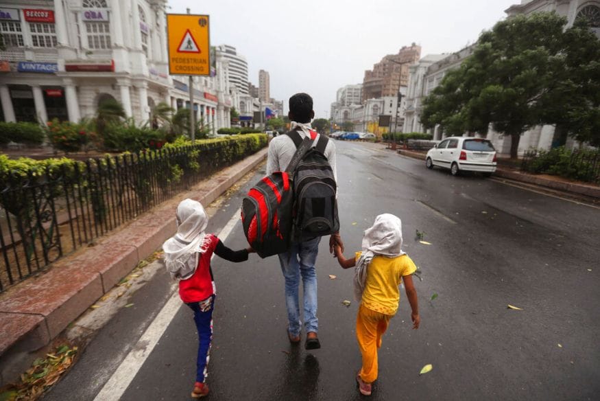 Heartbreaking Photos of Migrants Struggling To Go Home - News18