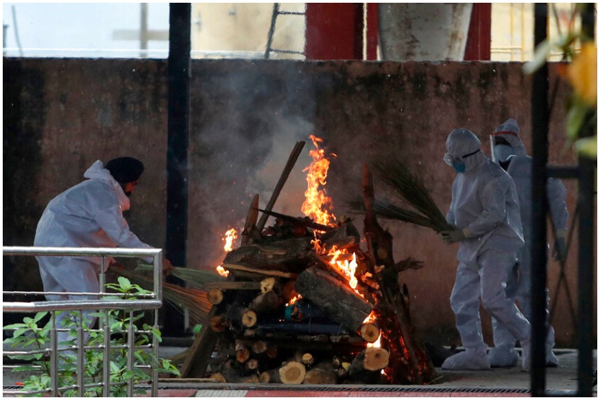 Burial & Cremation of COVID-19 Victims - Heart Wrenching Pictures ...