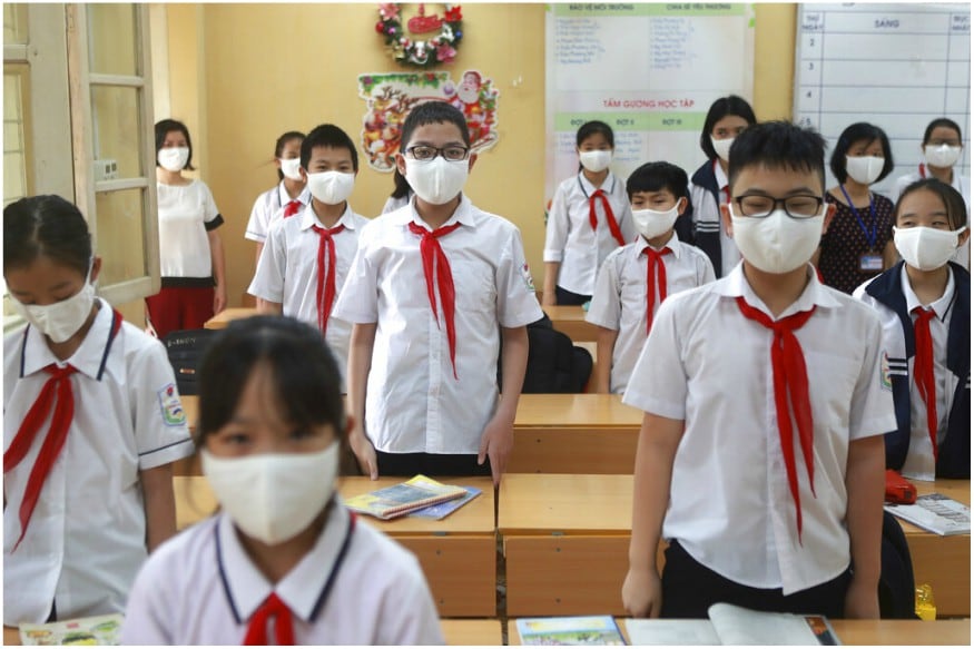 Students Return to their Classrooms as Vietnam Schools Reopen After ...