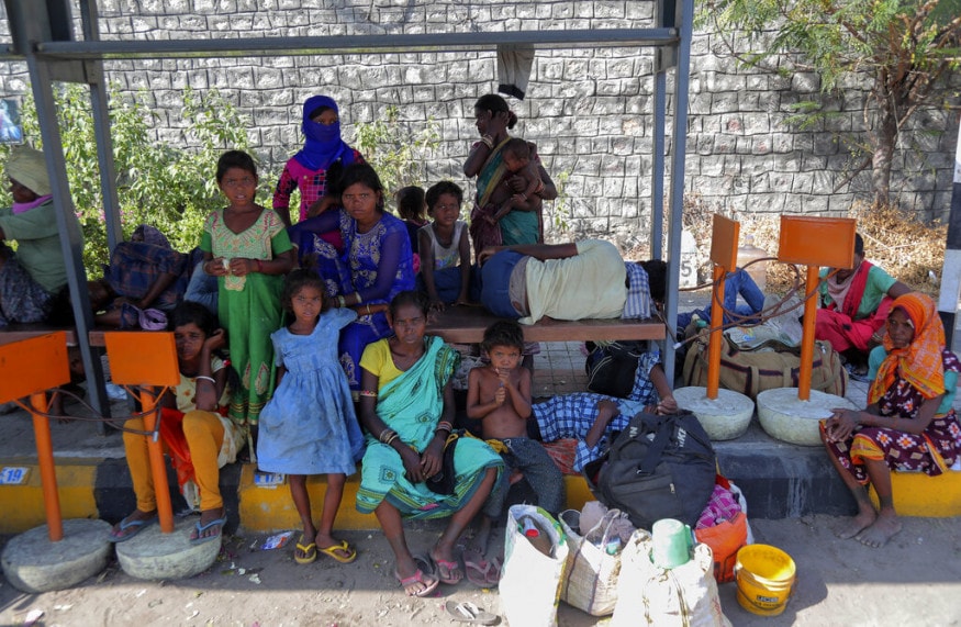 Heartbreaking Photos of Migrants Struggling To Go Home - News18