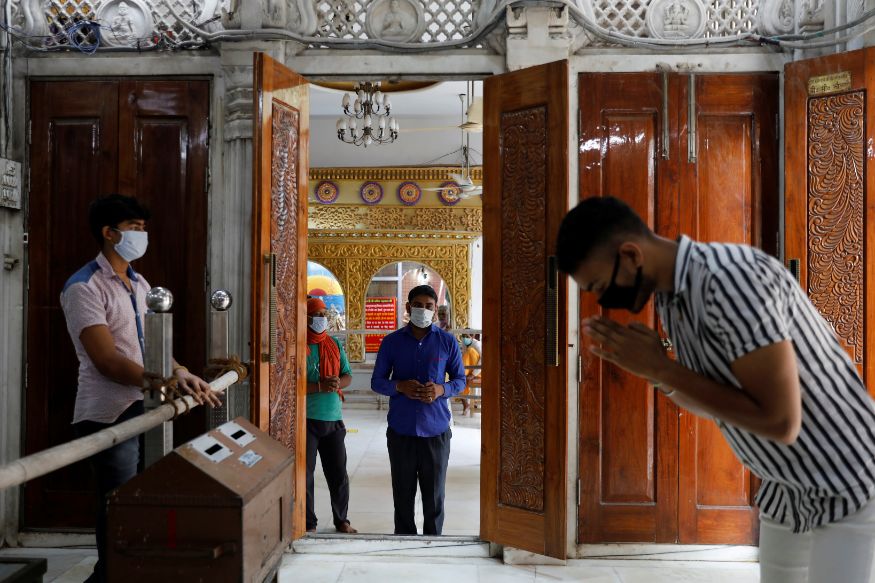 Devotees Throng Religious Places as Temples Across India Reopen - News18