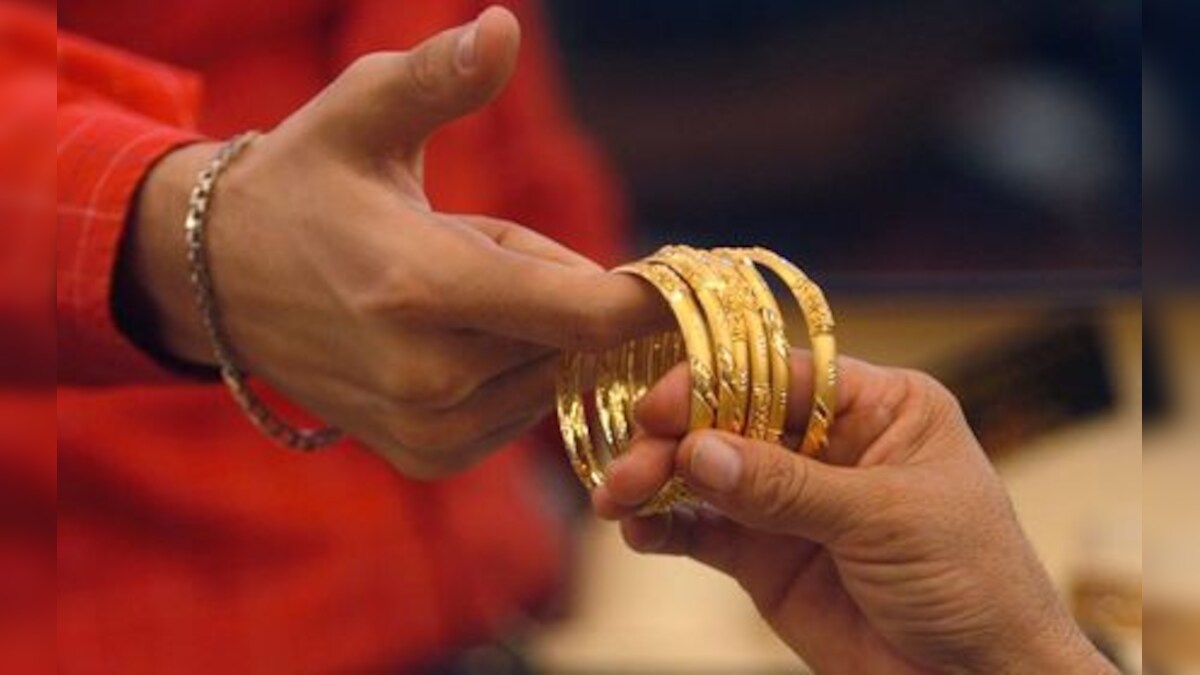 Gold Gains On Stimulus Bets Ahead Of Speech By Fed's Powell - News18