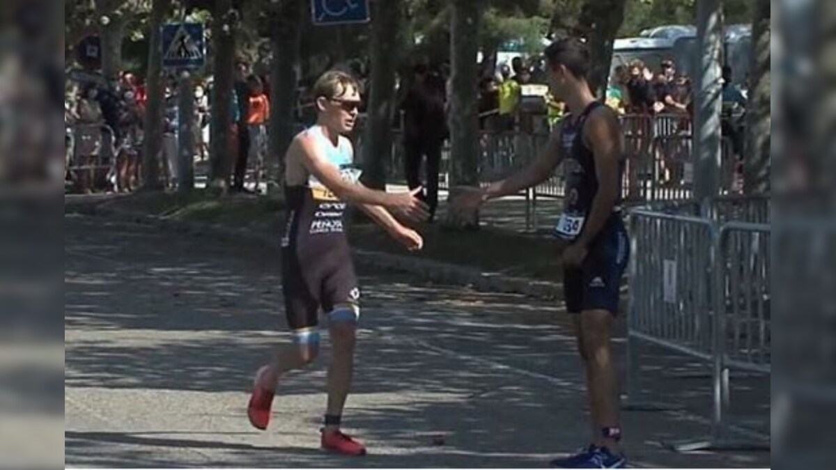 Triathlete Stops at Finish Line to Make Way for Rival who Took Wrong ...