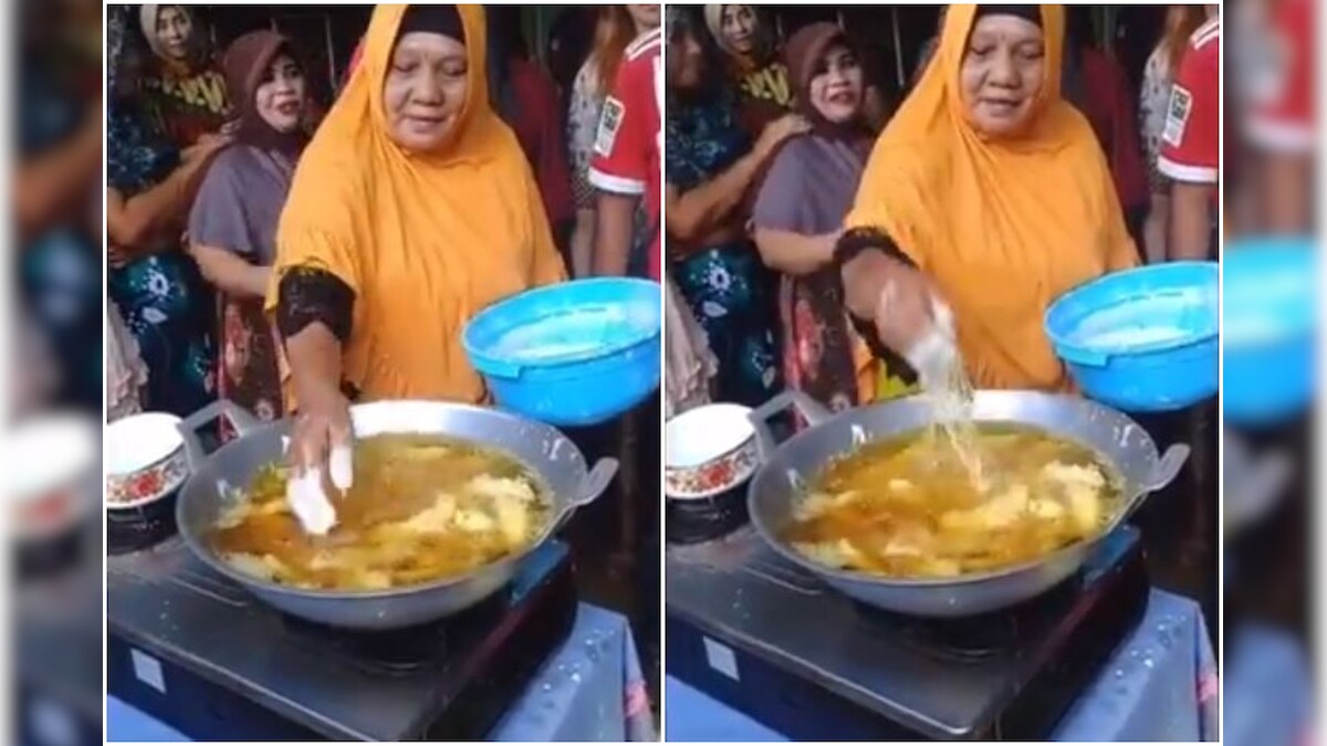 Woman Effortlessly Puts Her Hand in Hot Oil to Fry Food, Viral Video ...