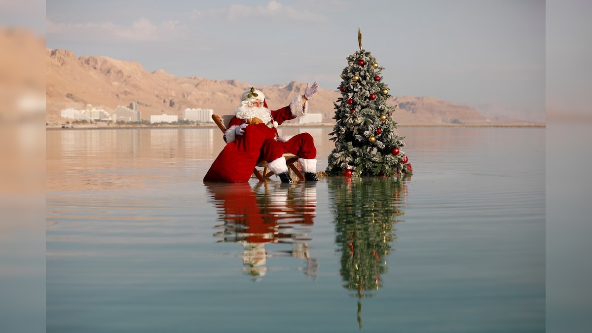 Swimming Santa Brings Dead Sea Back to Life With Christmas Tree And ...
