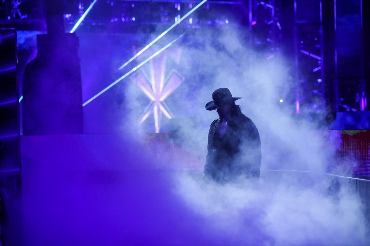 The Undertaker Bids Goodbye to WWE: Stunning Images from the Farewell ...