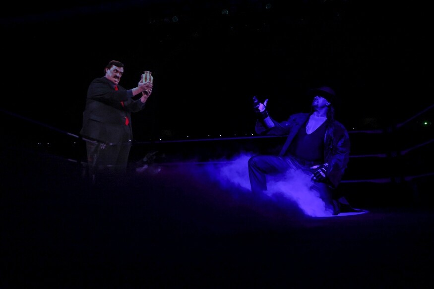 The Undertaker Bids Goodbye to WWE: Stunning Images from the Farewell ...
