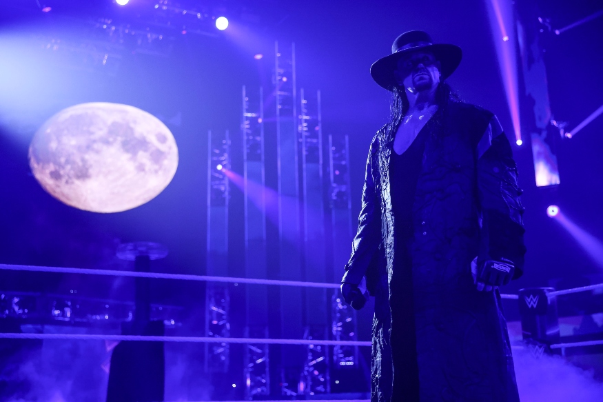The Undertaker Bids Goodbye to WWE: Stunning Images from the Farewell ...