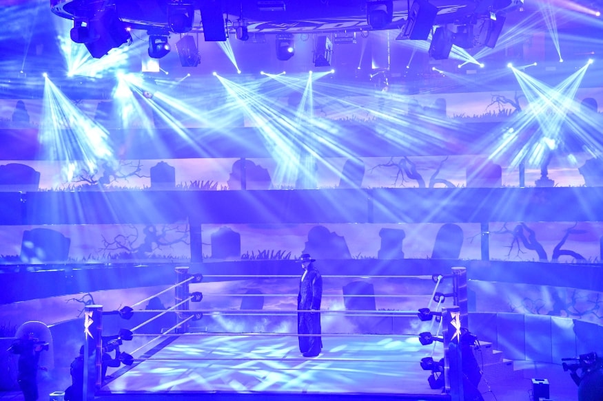The Undertaker Bids Goodbye to WWE: Stunning Images from the Farewell ...
