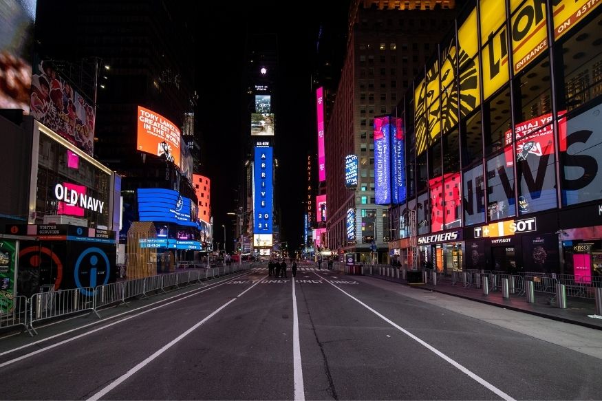 Confetti on Deserted Streets and Barricades: New York's Times Square ...