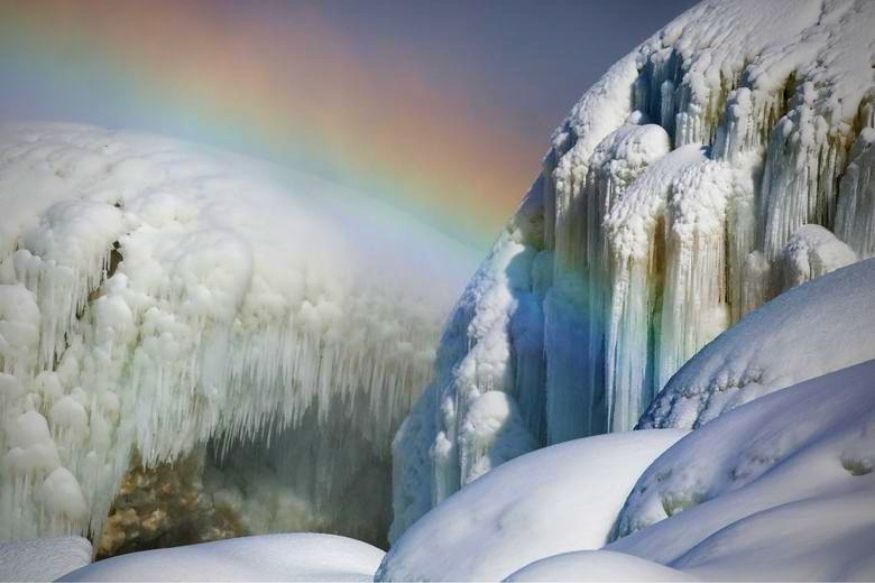 Niagara Falls Freezes Creating a Surreal Spectacle of Ice and Rainbow ...