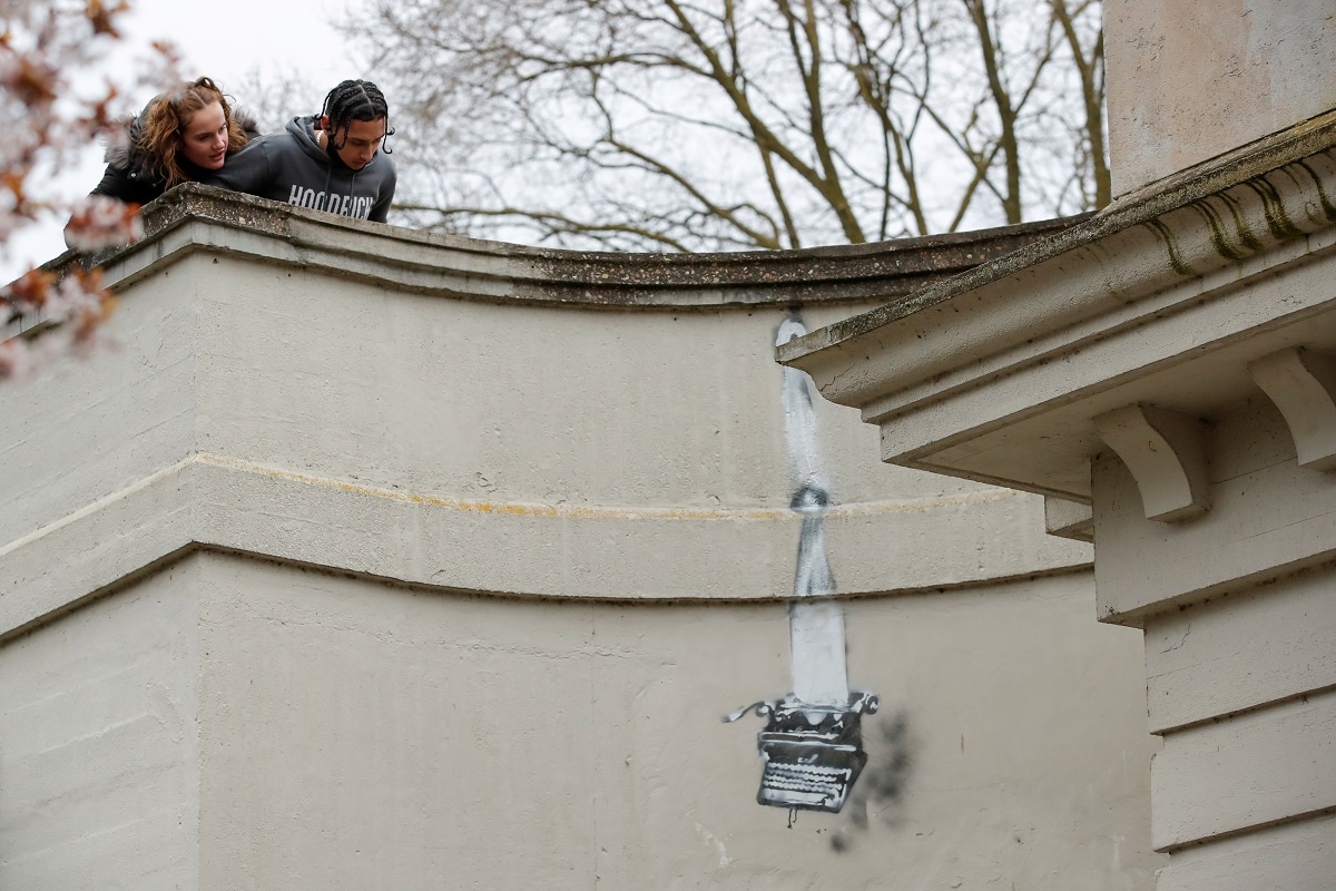 Banksy, is That You? New Reading Prison-style Mural Appears, This Time ...