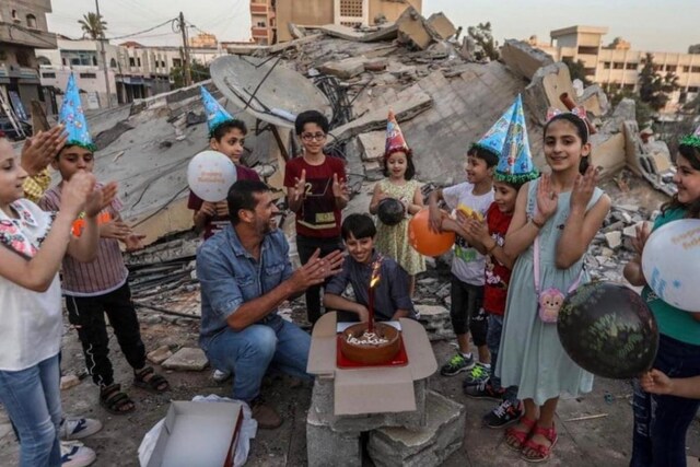 'Life Goes On': Gaza Boy Celebrates Birthday Near Building Debris in ...